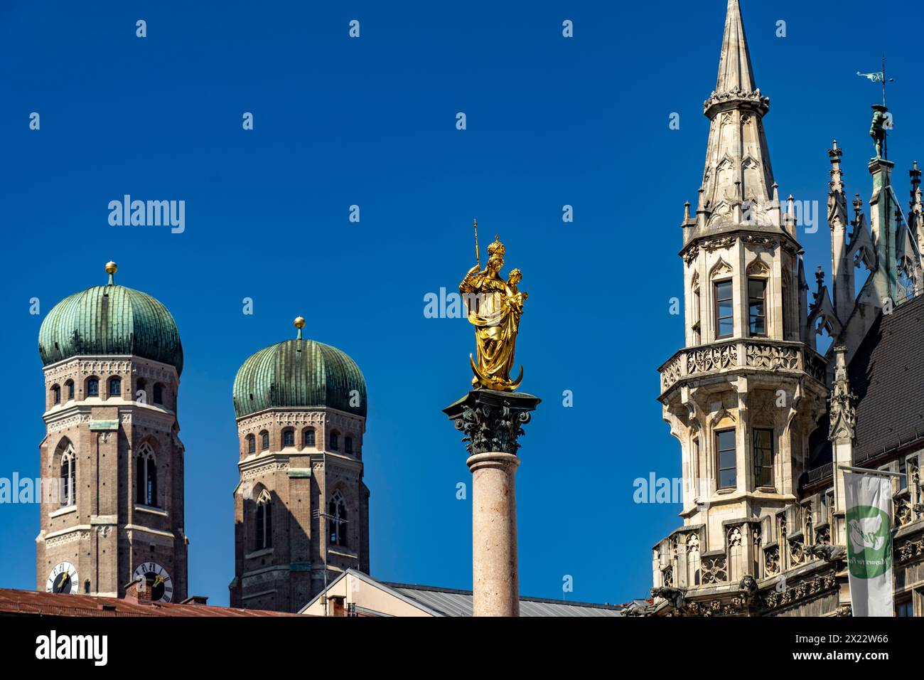 Statue of Mary on the Marian Column and the towers of the Frauenkirche ...