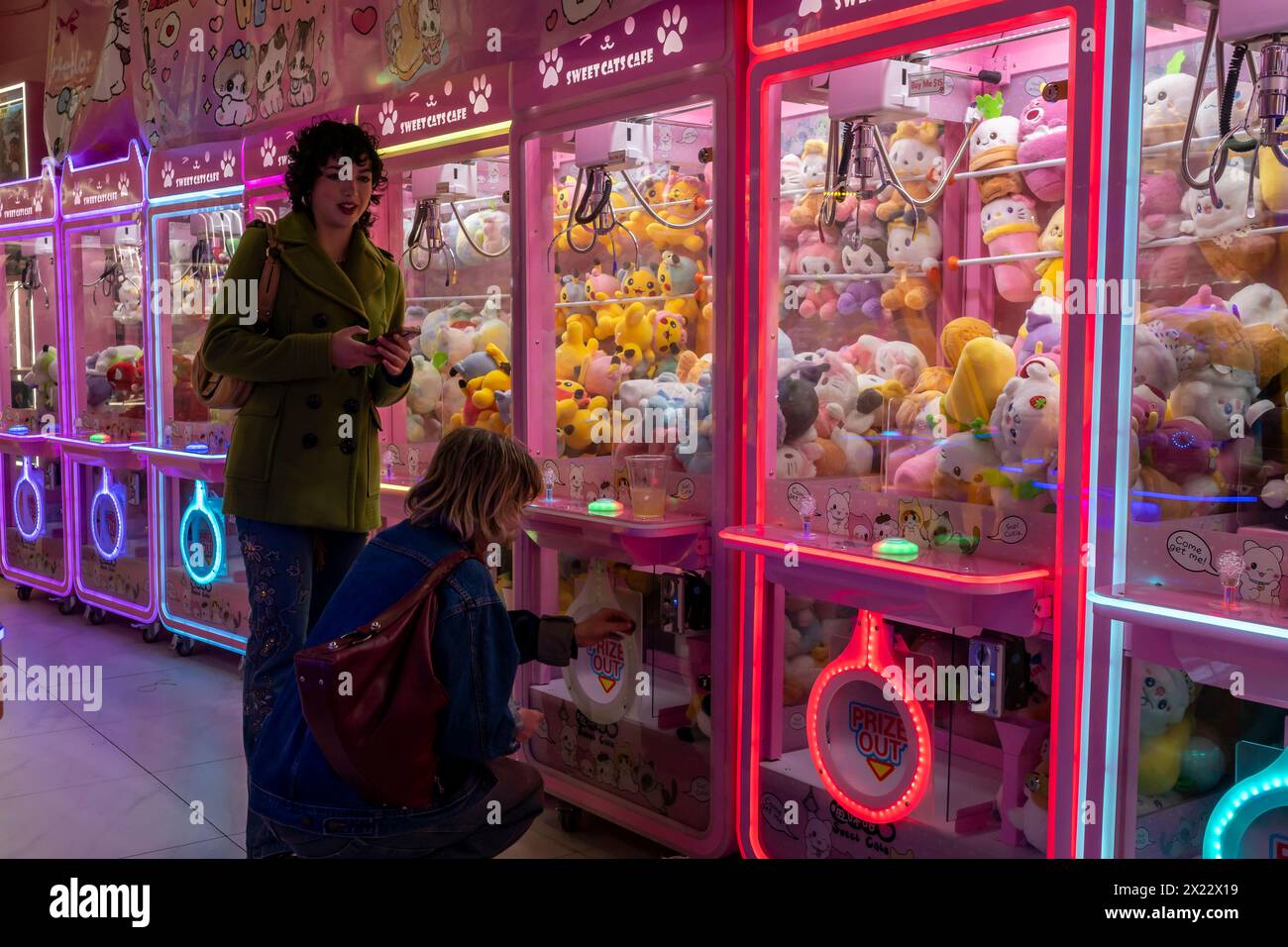 Visitors to Sweet Cats Bubble Tea and Claw Machines in the Union Square neighborhood of New York ...