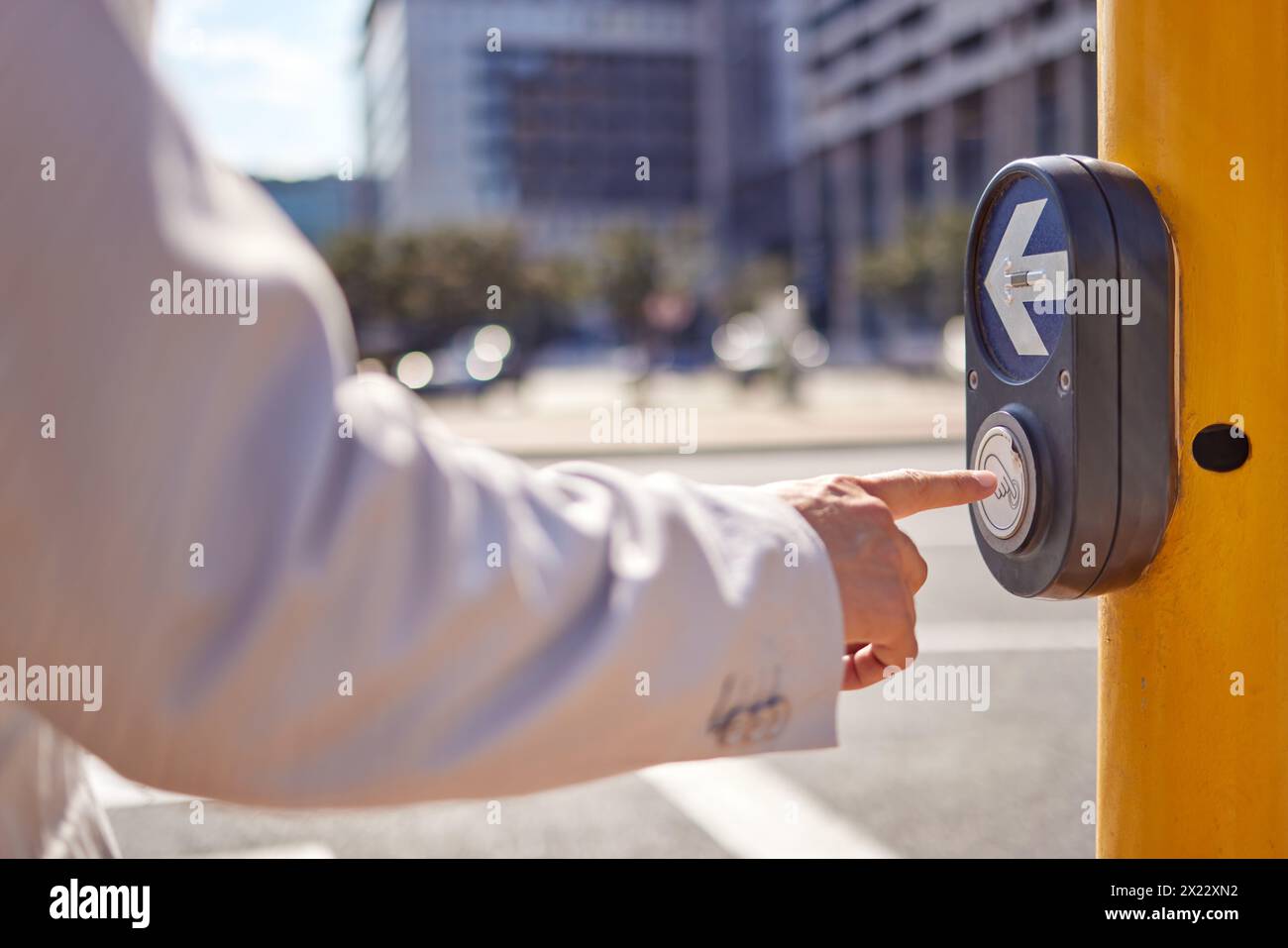 Businessman, hand and crosswalk button for safety, travel and walking ...