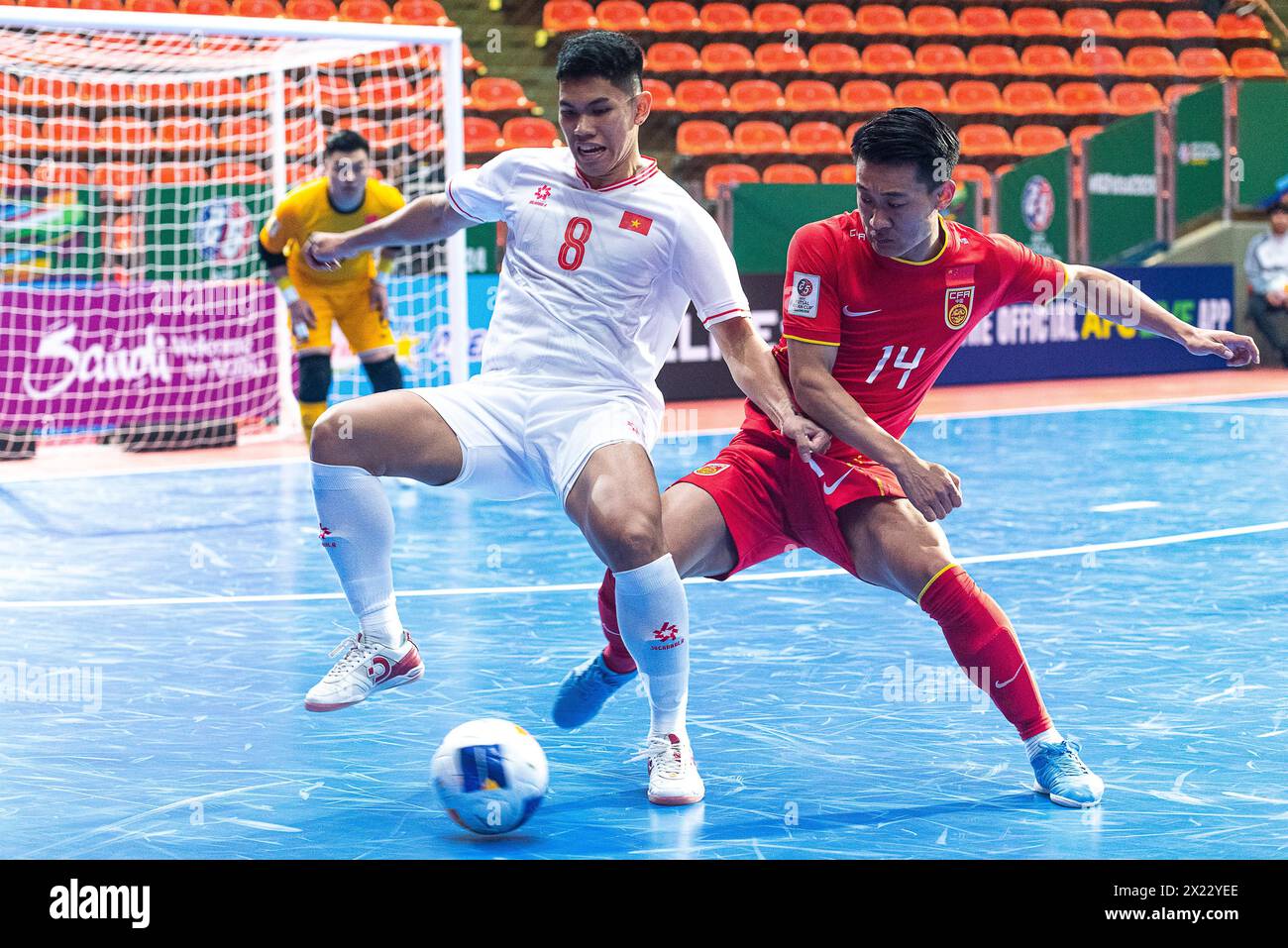 Bangkok, Thailand. 19th Apr, 2024. Dao Minh Quang #8 of Vietnam and Xie Zhuozhuang #14 of China ...