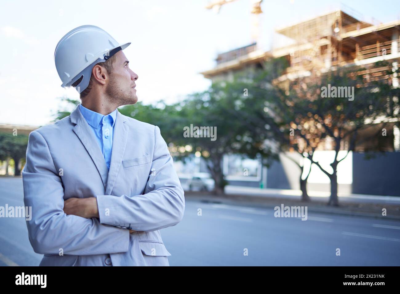 Architecture, arms crossed and vision with business man outdoor on ...