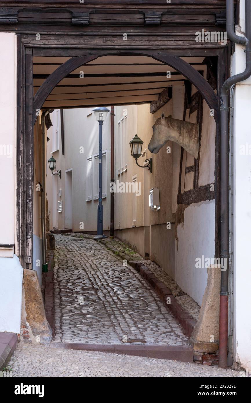 Narrow alley with cobblestones in the historic old town, Schlossgasse ...