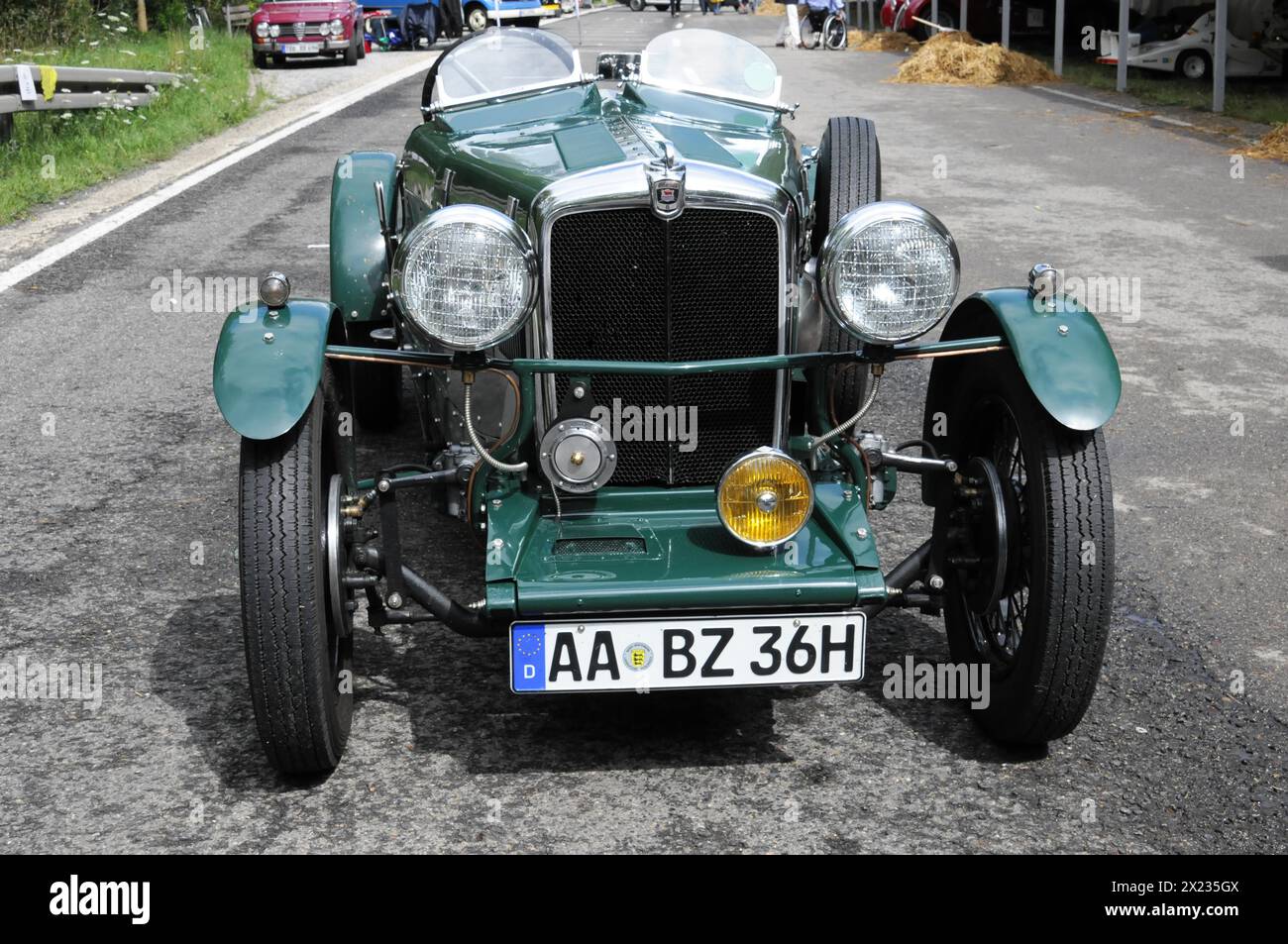 Morris 8, A detailed green vintage car with yellow headlights, SOLITUDE ...