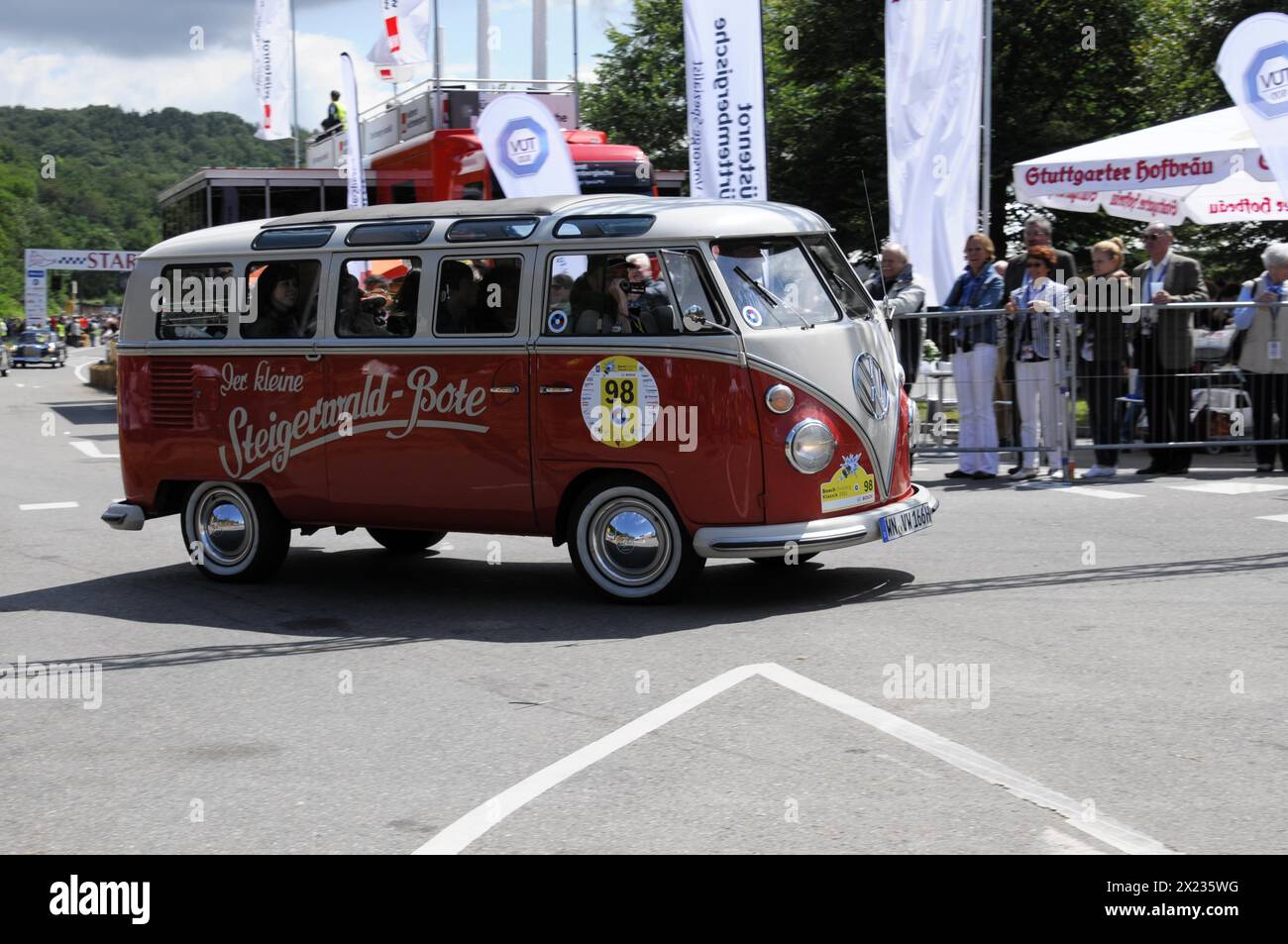 A red and white VW bus in retro design at a classic car race, SOLITUDE ...