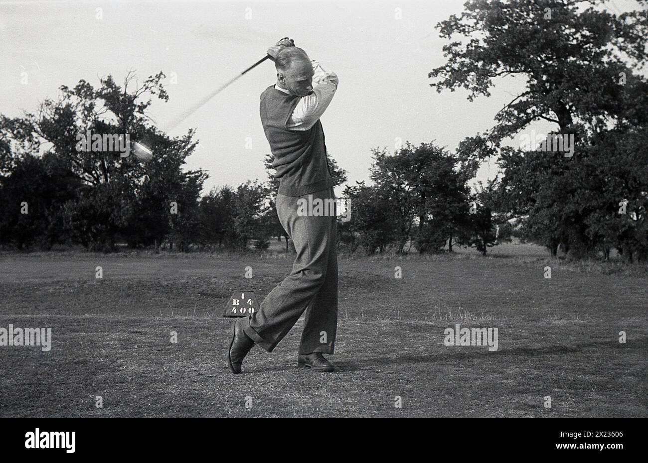 1951, historical, on a flat inland golf course, side-view of a ...
