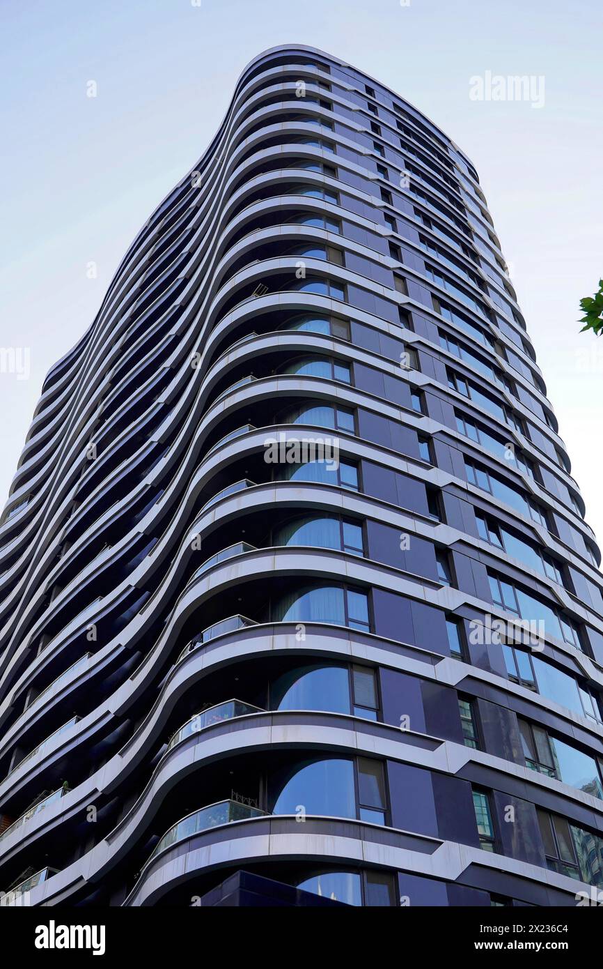 Shanghai, China, Asia, Modern skyscraper with undulating facade against ...