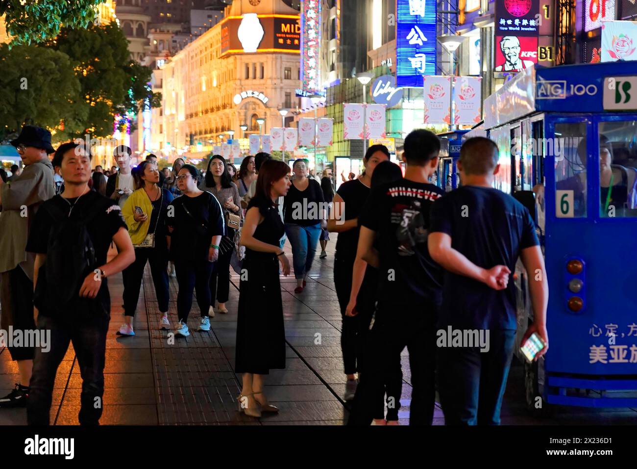 Shanghai at night, China, Asia, Crowd on an illuminated street in the ...