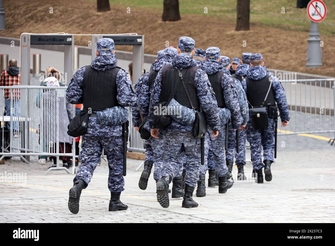 Soldiers of russian military forces of National Guard walking down the ...