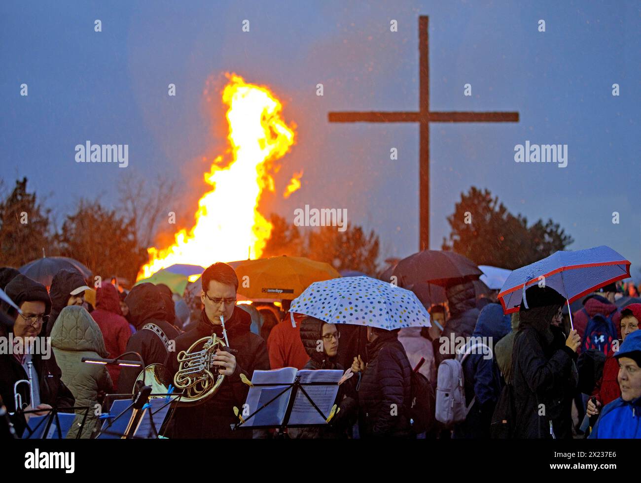 Musicians with a double horn in front of the Easter bonfire on the ...