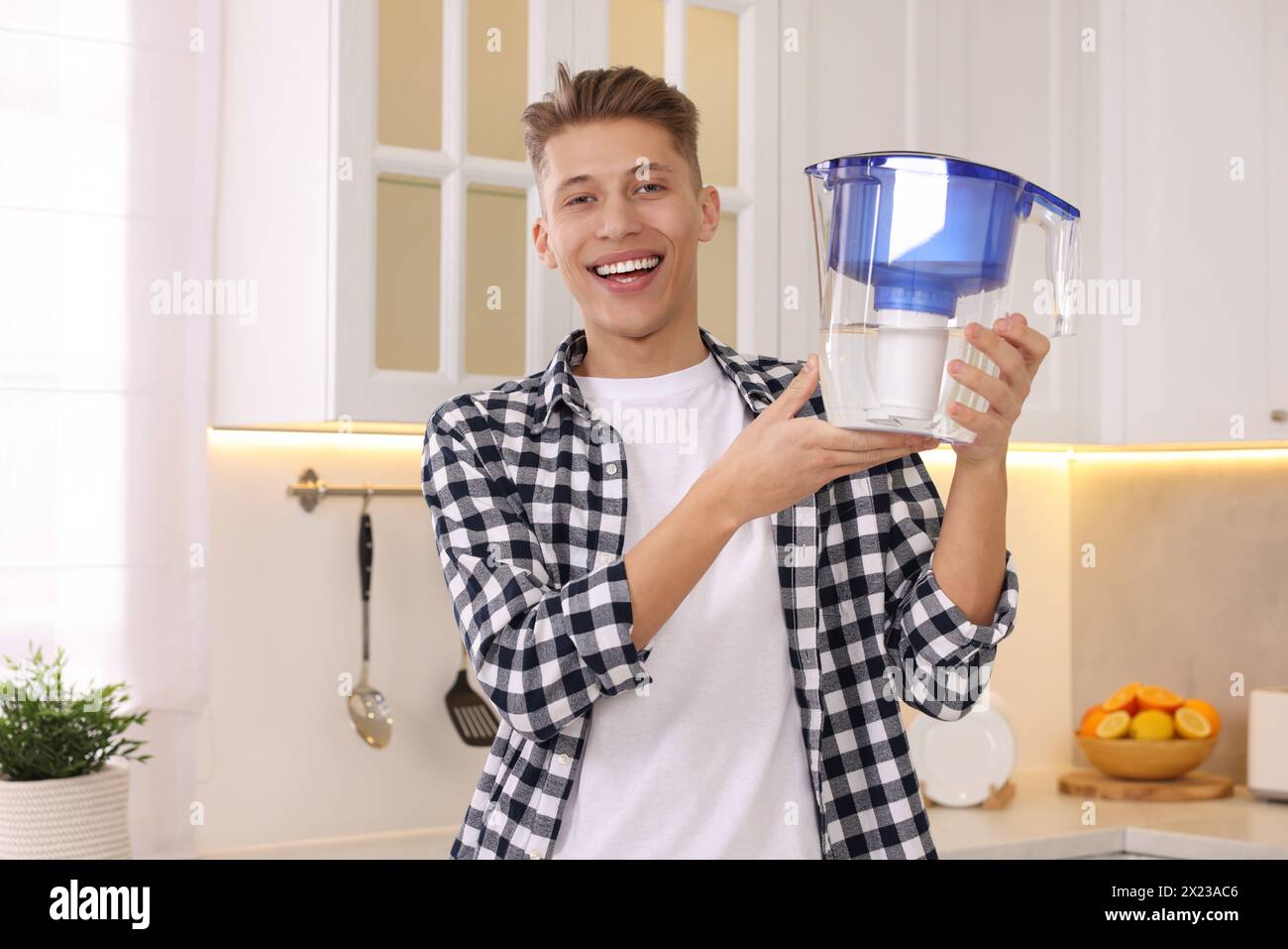 Young water container hi-res stock photography and images - Alamy
