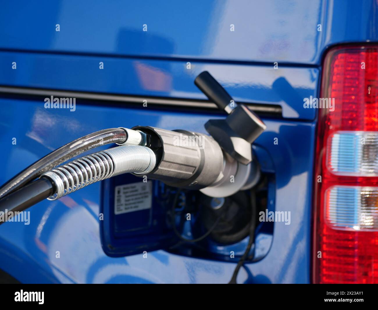 Compressed natural gas vehicle fuel nozzle Stock Photo - Alamy