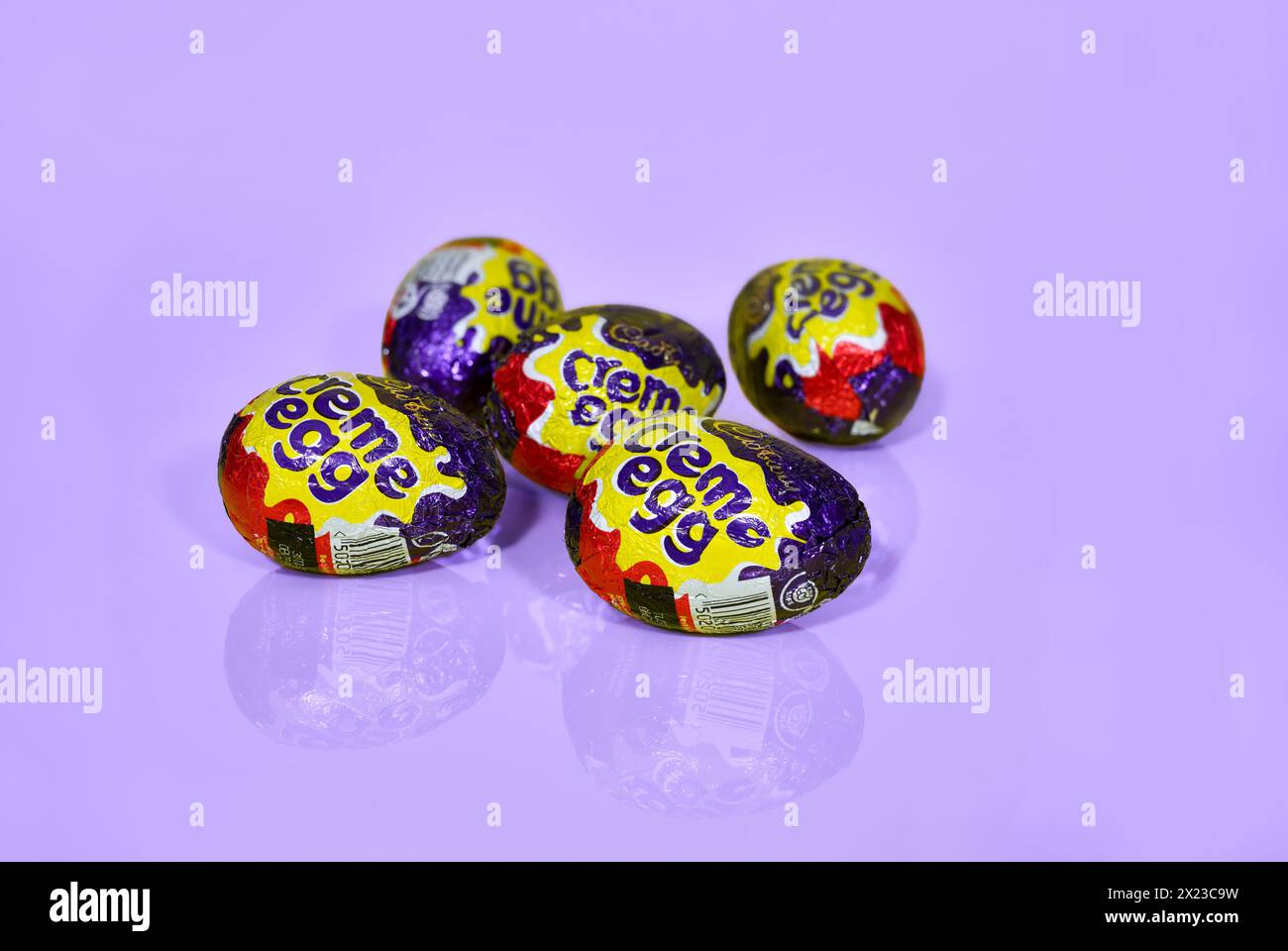 Five Cadbury Creme Eggs on a light purple background, Easter Eggs Stock ...