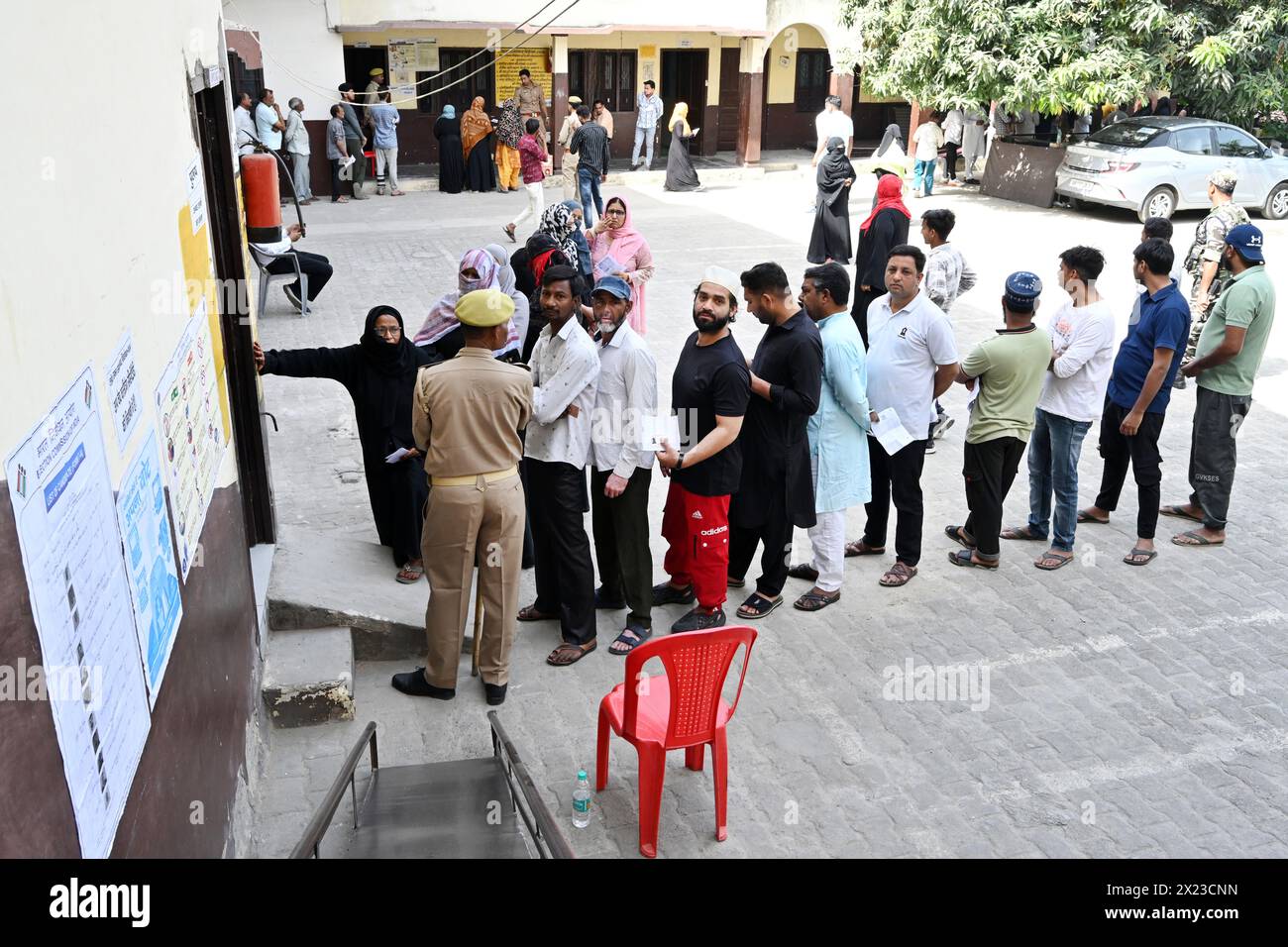 MUZAFFARNAGAR, INDIA - APRIL 19: Voters seen standing in queues to cast ...