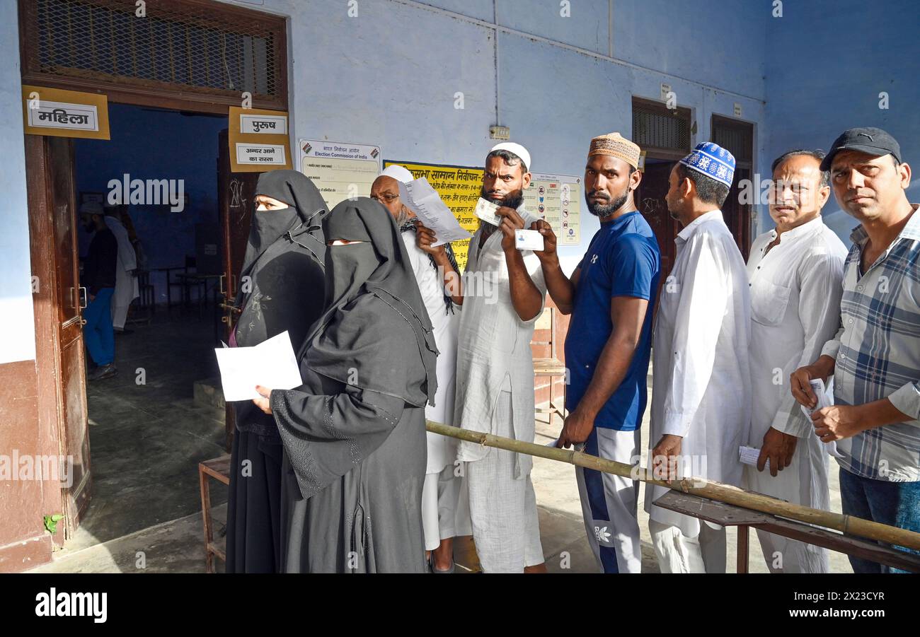 MUZAFFARNAGAR, INDIA - APRIL 19: Voters seen in queues to cast their ...