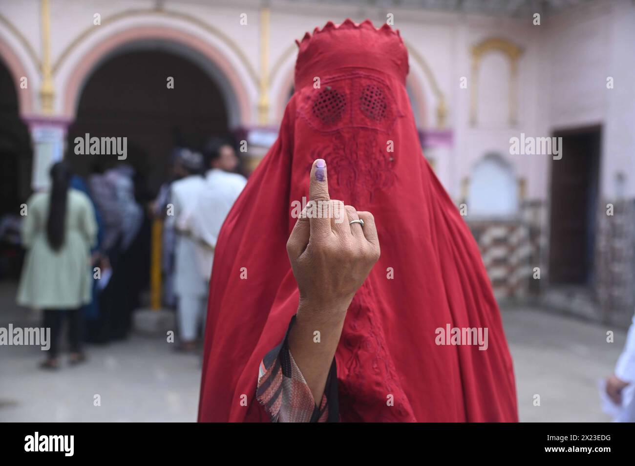 Kairana, Uttar Pradesh, India. 19th Apr, 2024. A woman clad in burqa ...
