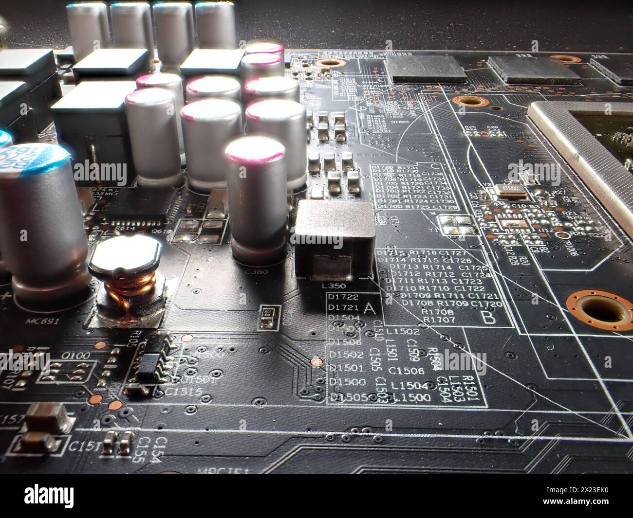 A close-up of a printed circuit board and small components, of which there is a severe shortage ...