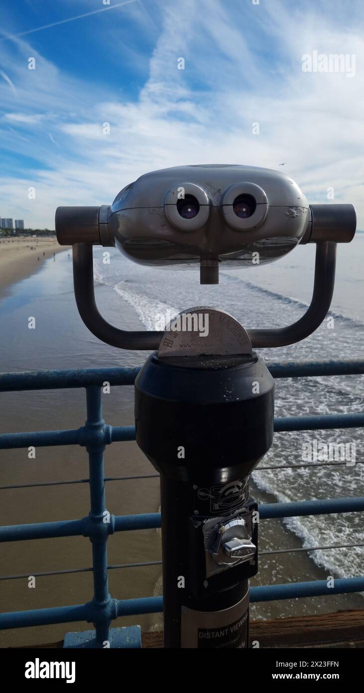 Funny alien-looking binoculars on the edge of a sandy beach Stock Photo ...