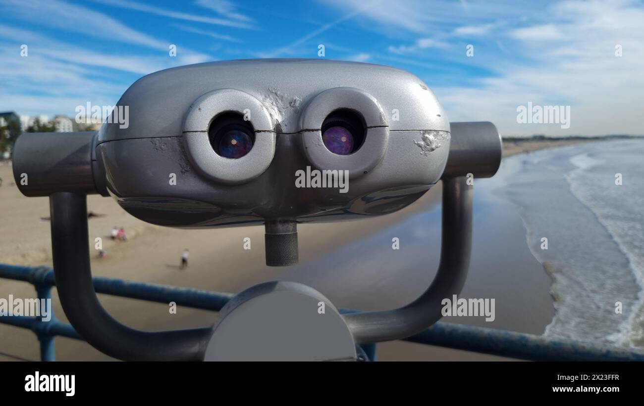Funny alien-looking binoculars on the edge of a sandy beach Stock Photo ...
