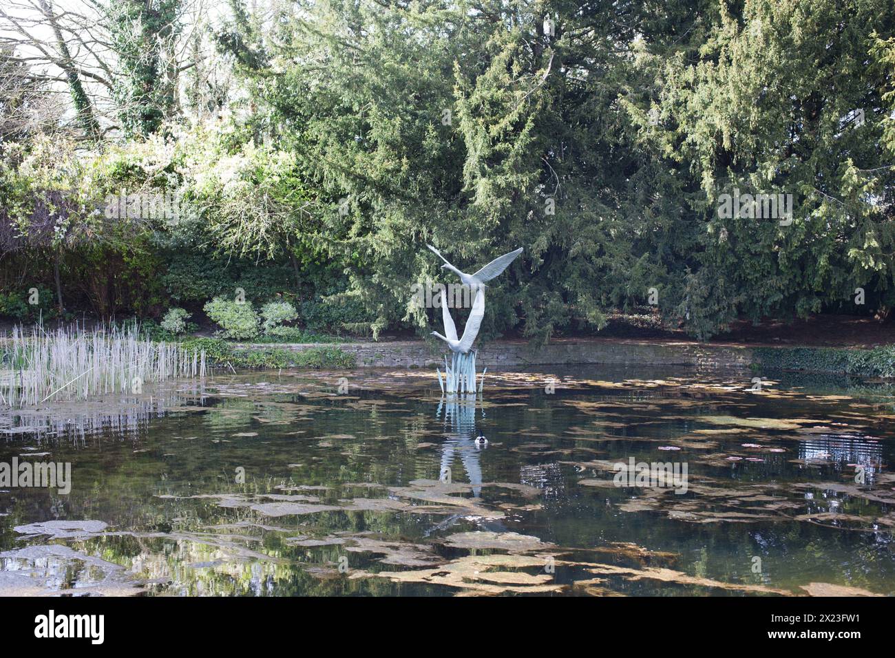 A statue of birds flying in the grounds of Le Manoir aux Quat Saisons ...