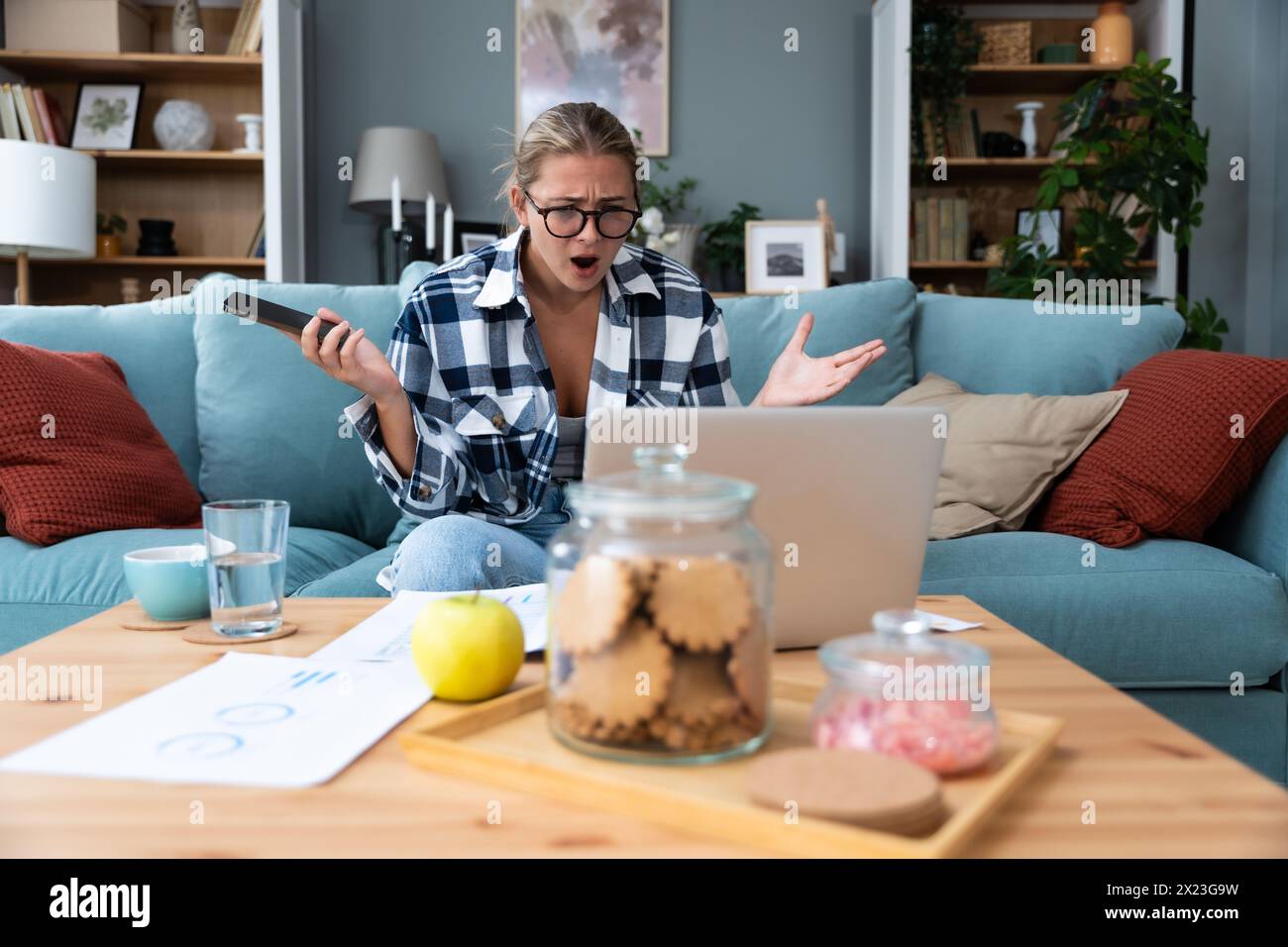 Young freelance business finance woman has a problem with attention ...