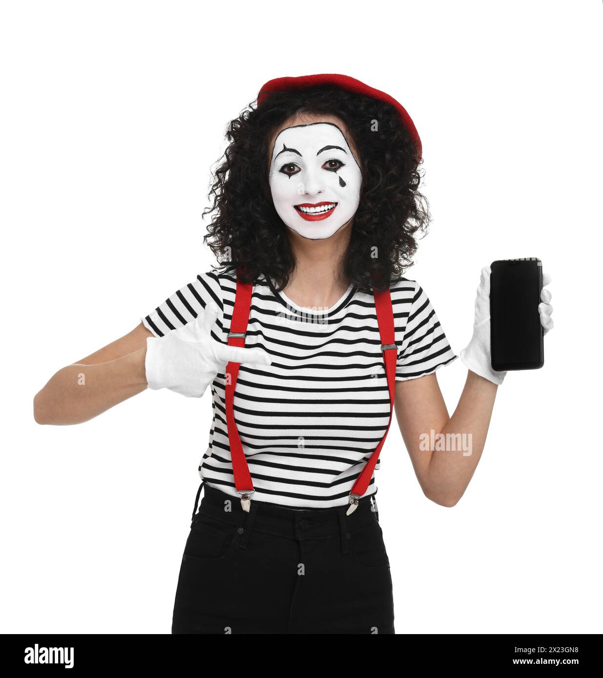Funny mime with smartphone posing on white background Stock Photo - Alamy