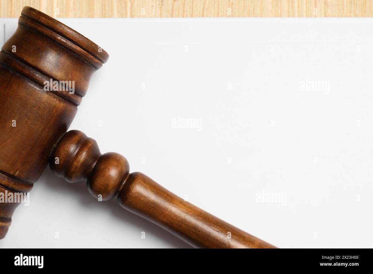 Law. Blank paper sheet and gavel on table, top view Stock Photo - Alamy