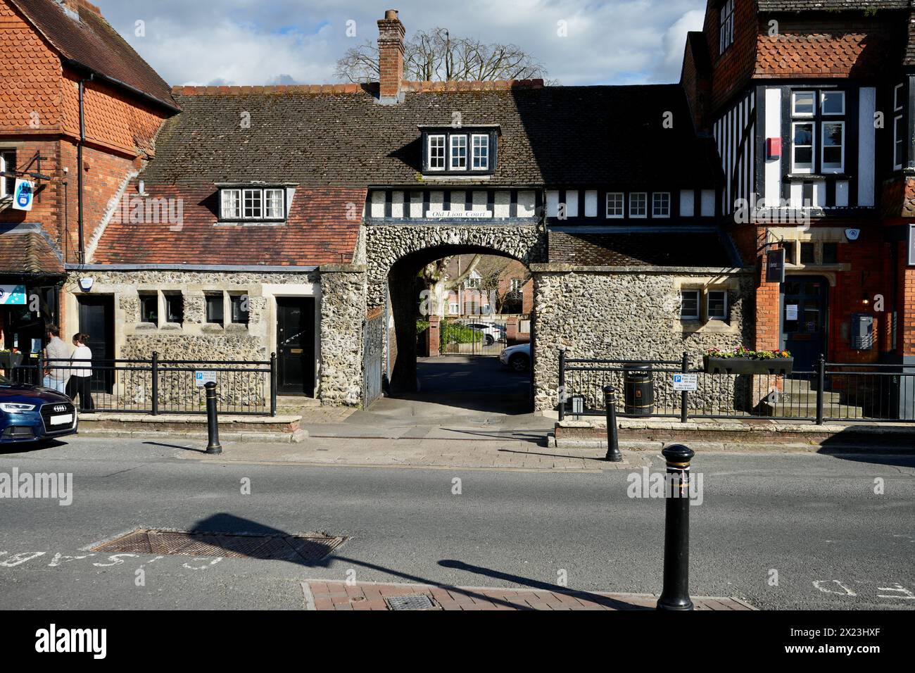 The arched entrance to The Old Lion Court Stock Photo - Alamy