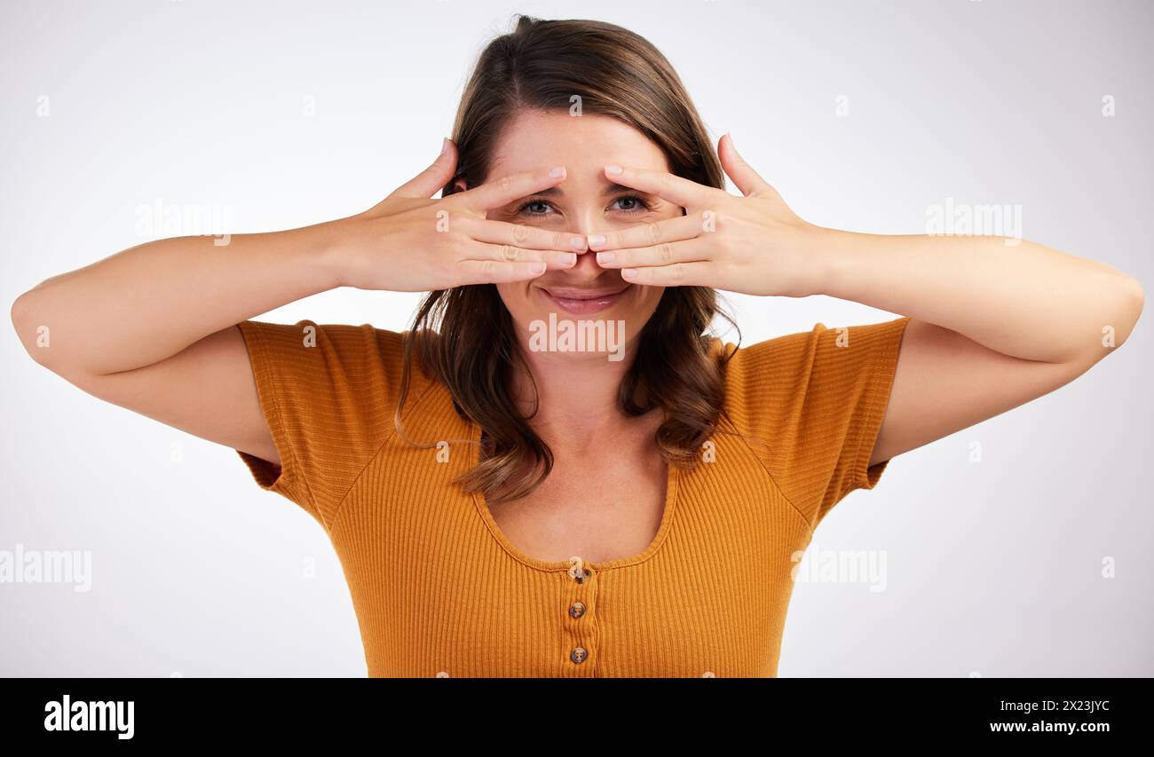 Cover, surprise and woman with hands on face to hide from scary fail in ...