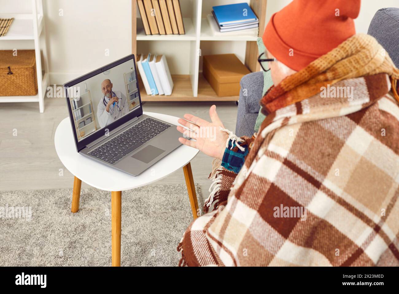 Sick senior man talking about the symptoms of illness having online ...