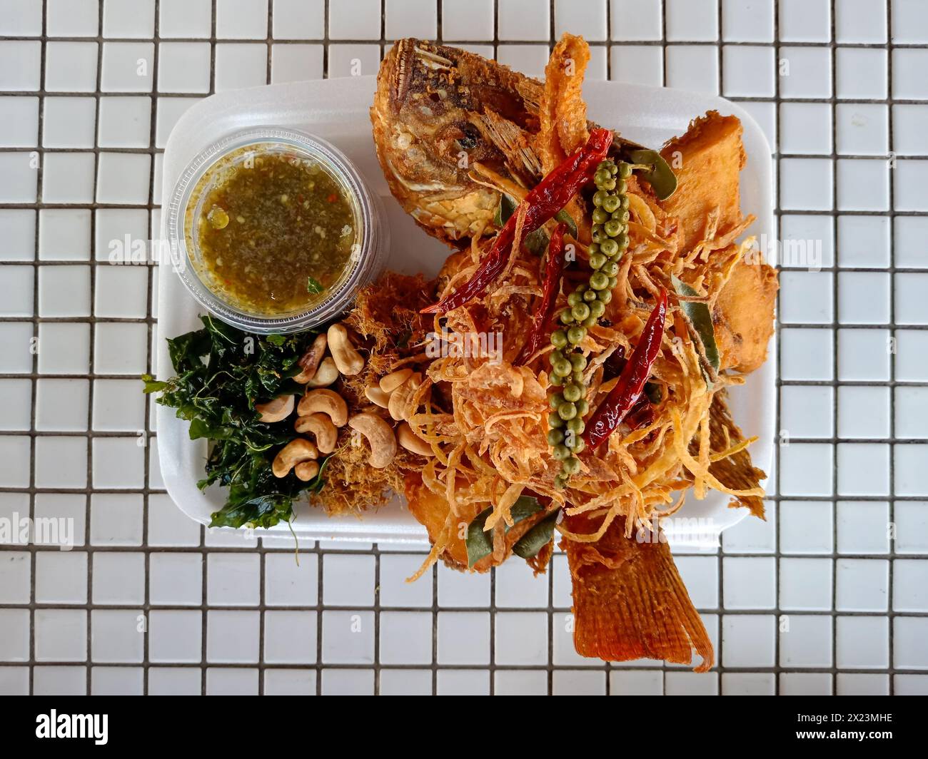 Plaa Tod Samoon Prai is a Thai food dish of deep fried fish and a ...