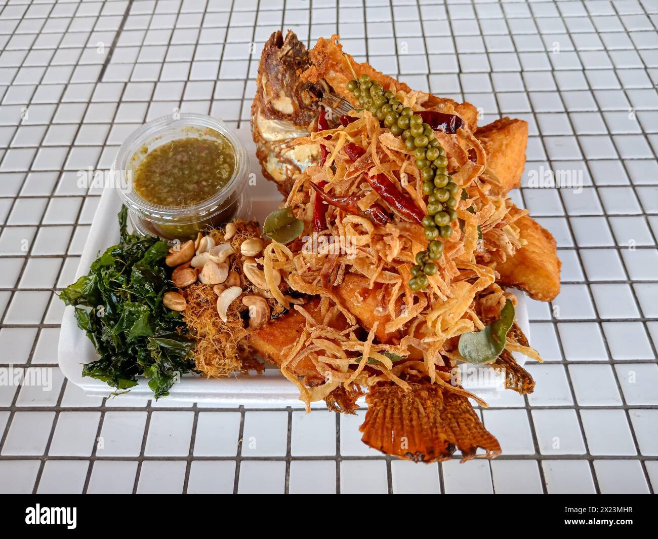 Plaa Tod Samoon Prai is a Thai food dish of deep fried fish and a ...