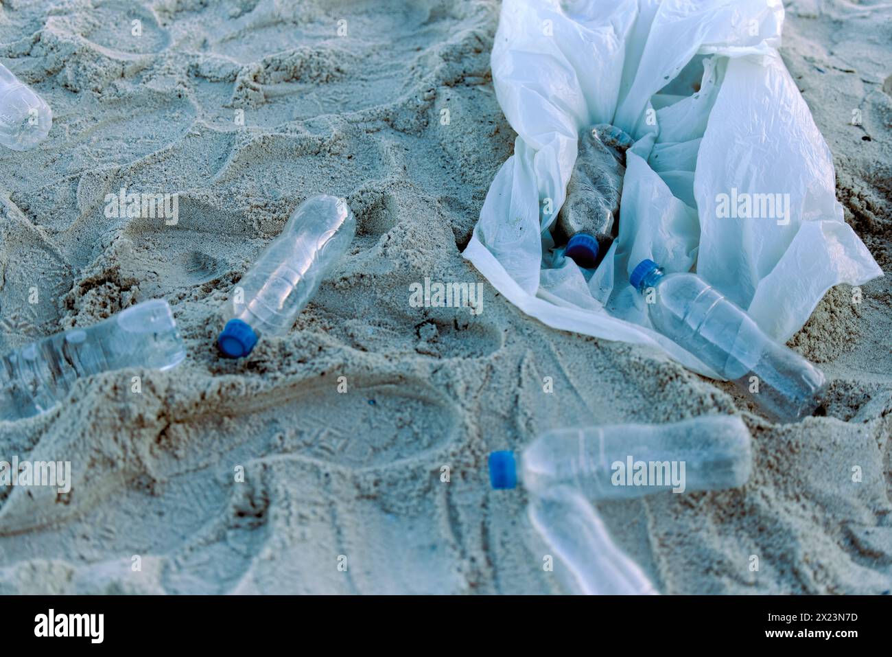 Plastic bottle, rubbish or recycling on sand pollution for clean up ...