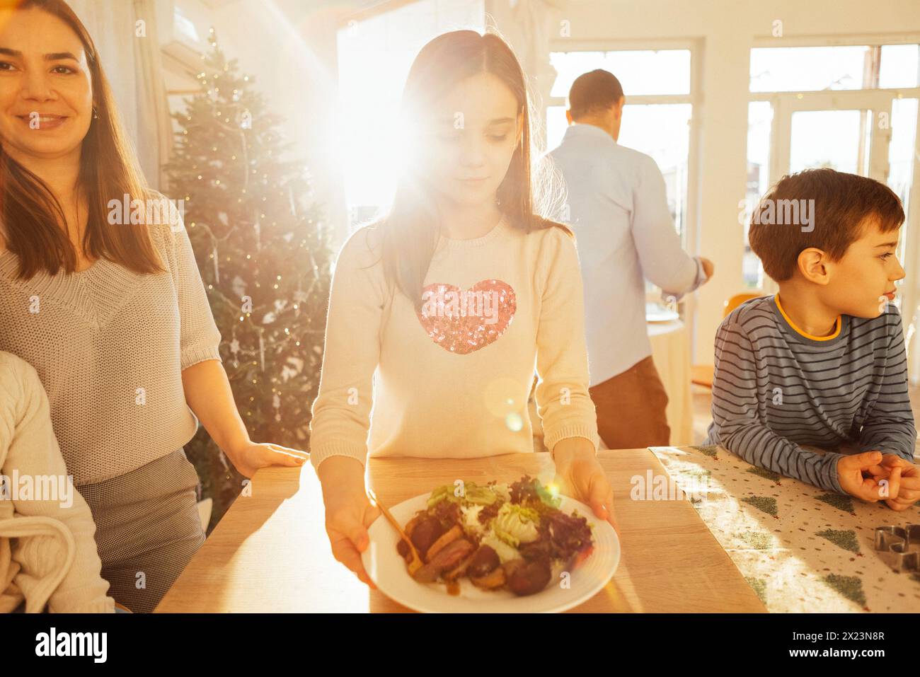 Son parents cooks food in hi-res stock photography and images - Alamy