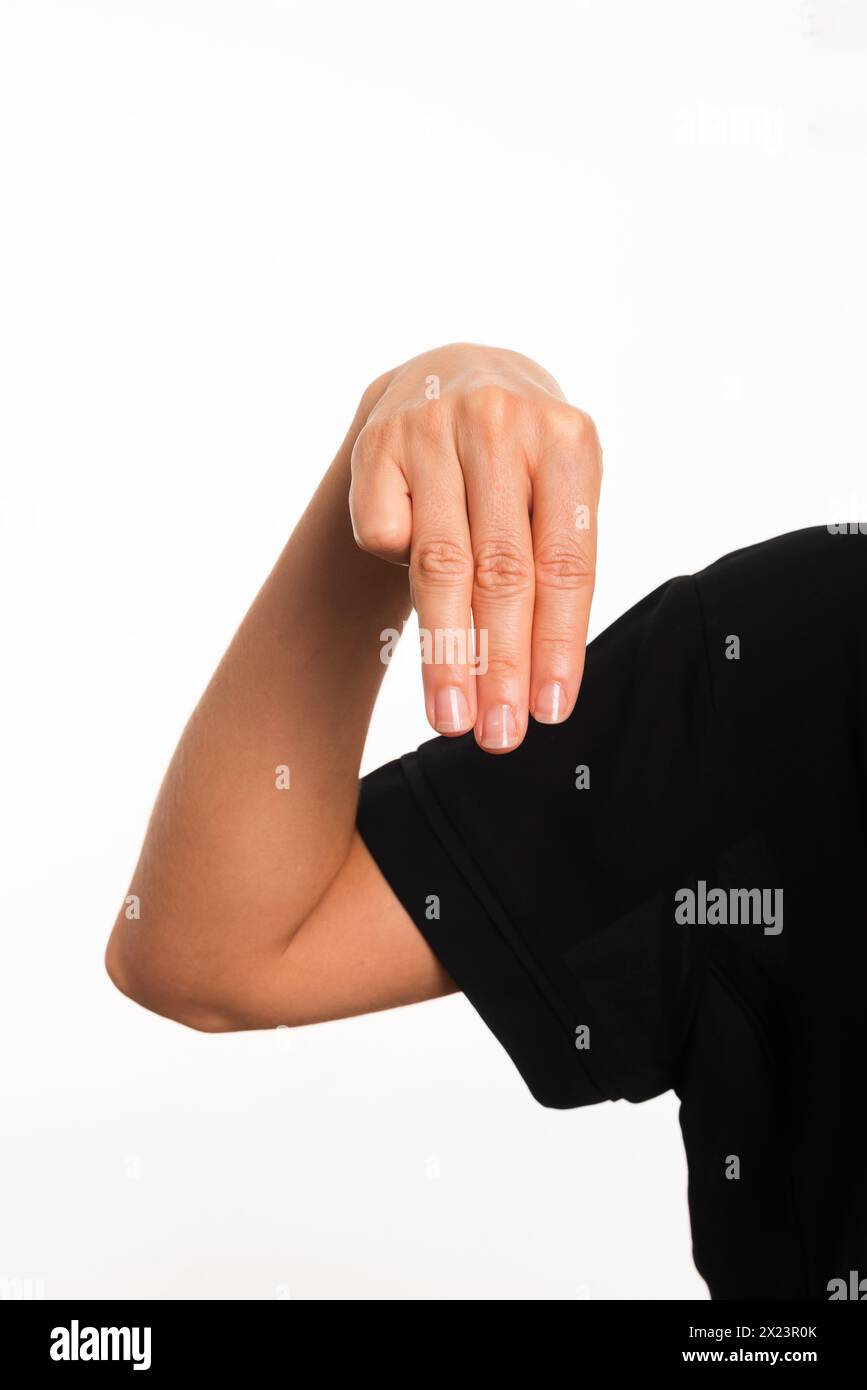 Close-up of a hand making the letter M in Brazilian sign language for ...