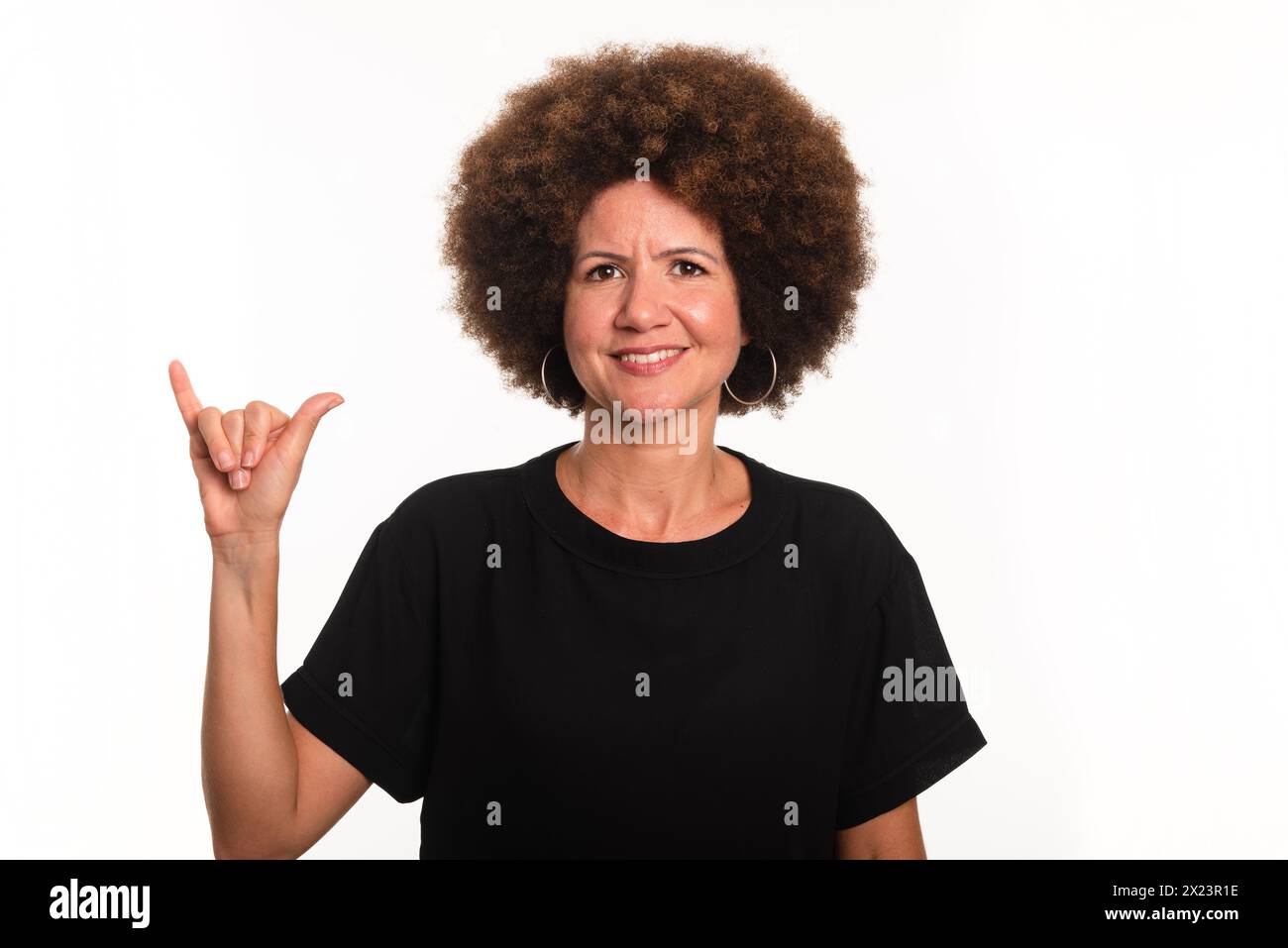 Female interpreter of the Brazilian sign language, Libras, making the ...