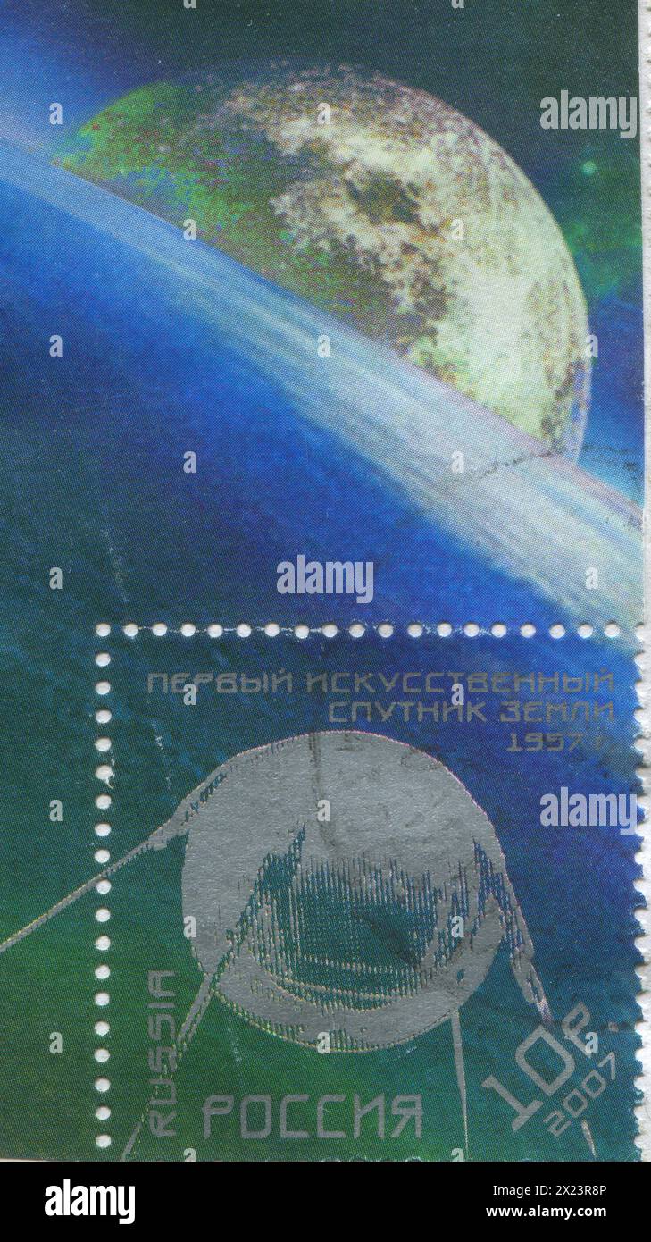 RUSSIA - CIRCA 2007: stamp printed by Russia, shows Sputnik 1 and Earth ...