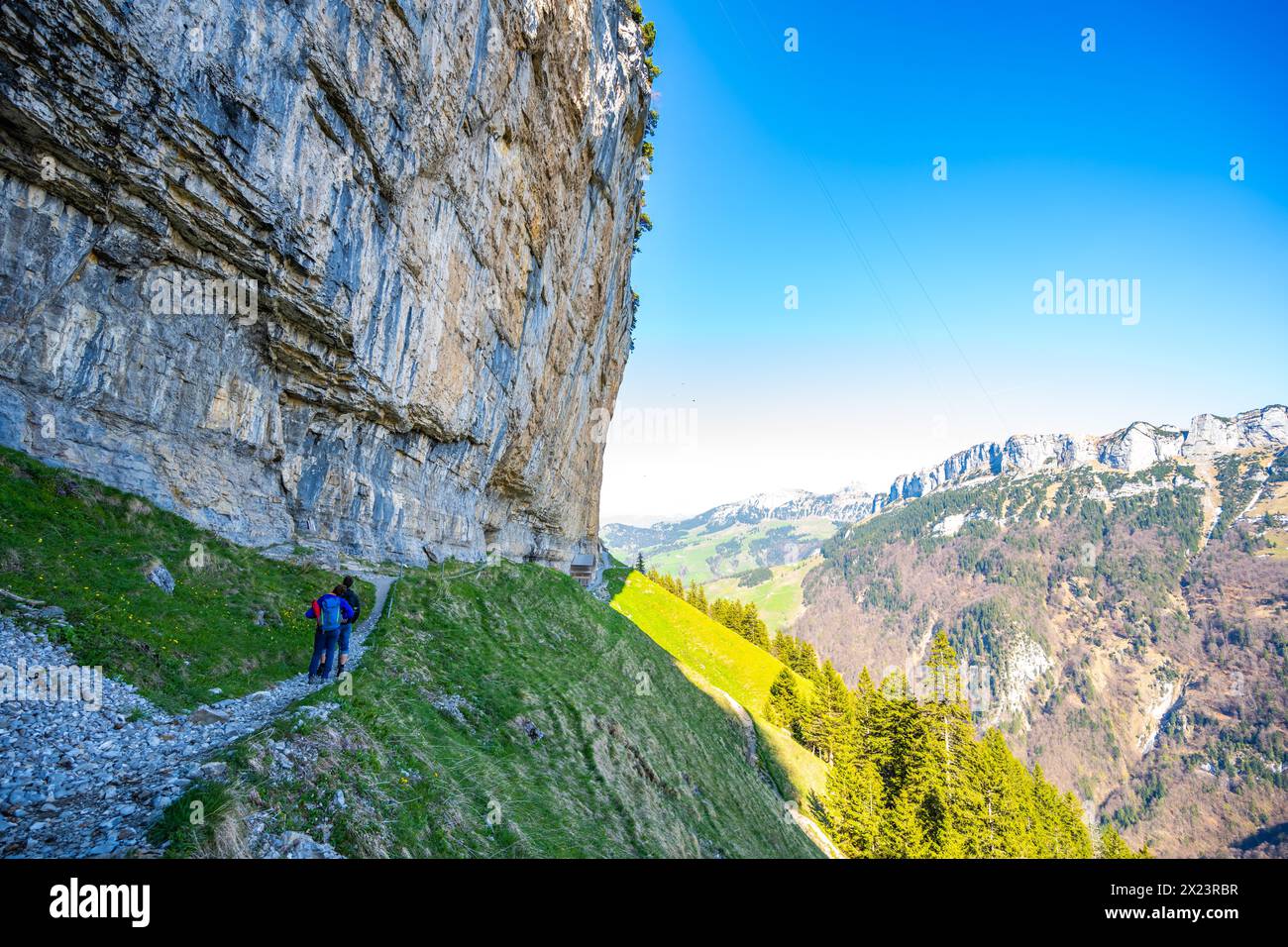 Description: Tourists on alpine trail to hut Gasthaus Aescher ...