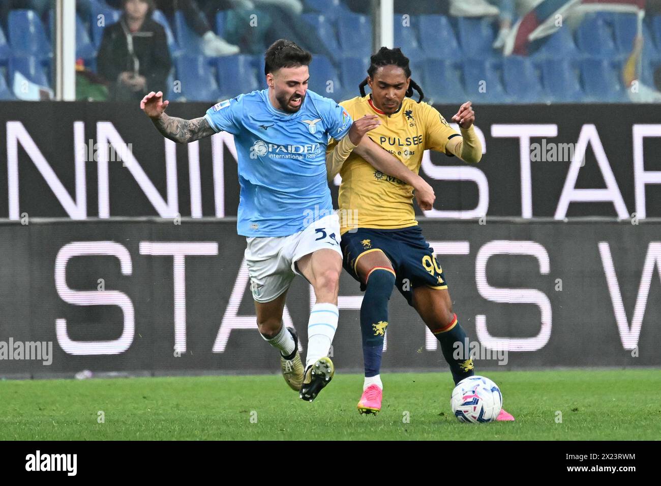 Genova, Italia. 19th Apr, 2024. Genoa's Djed Spence fights for the ball with Lazio's Mario Gila ...