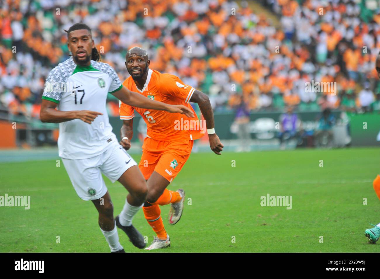 ABIDJAN, COTE D'IVOIRE - JANUARY 18; Alex Iwobi of Nigeria and Seko ...