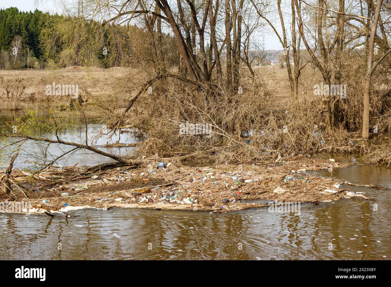 Congestion of accumulated garbage on the river, plastic pollution Stock ...