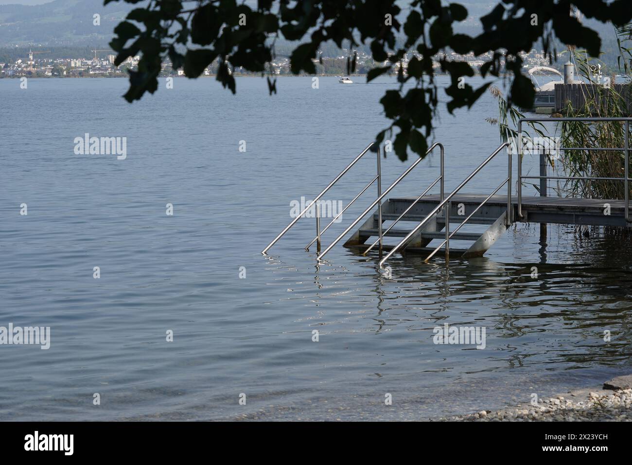 Steel stairs with railings for waterfront access. Side view showing ...