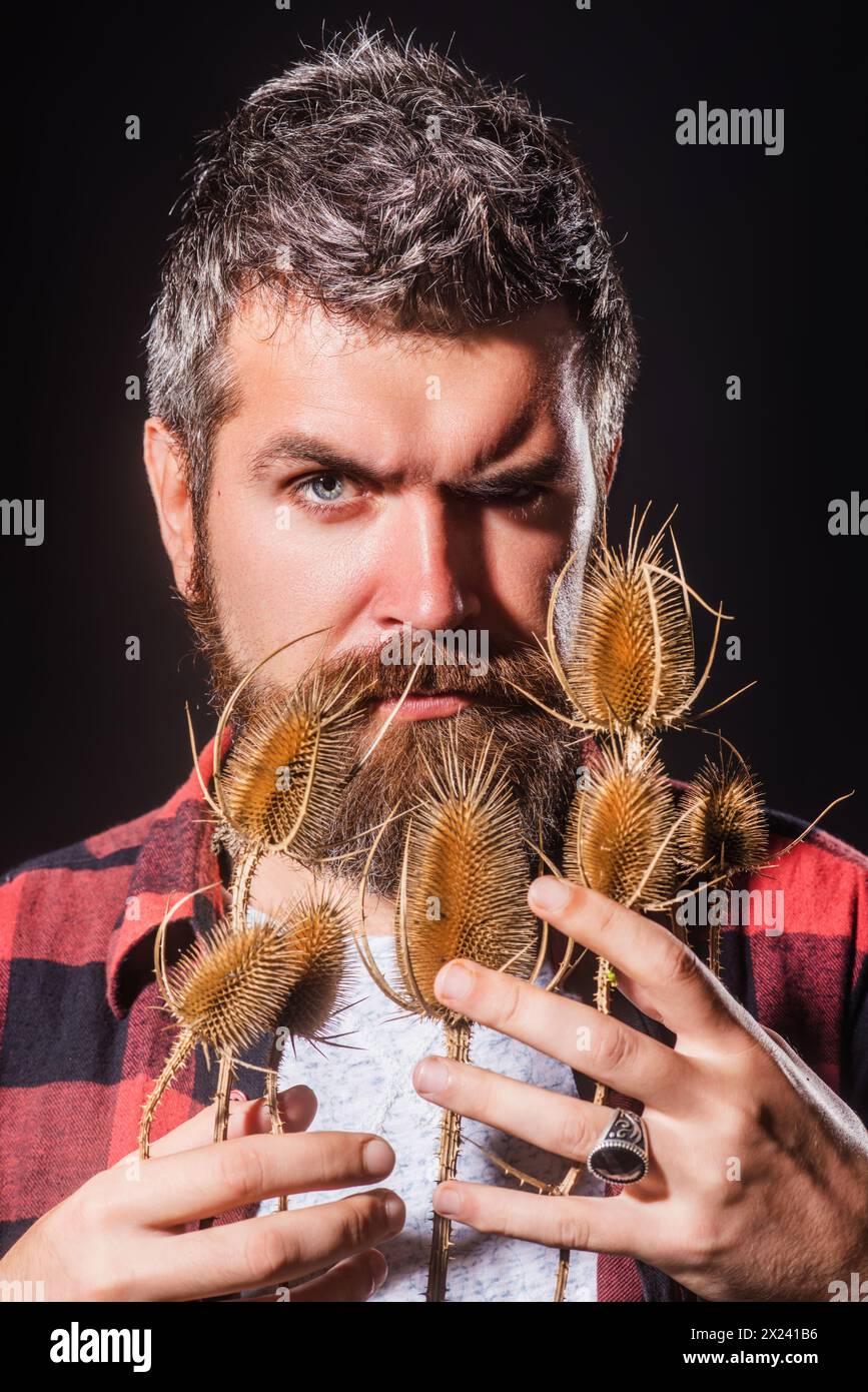 The man's beard was thick and well-groomed. Beard bristled. Male ...