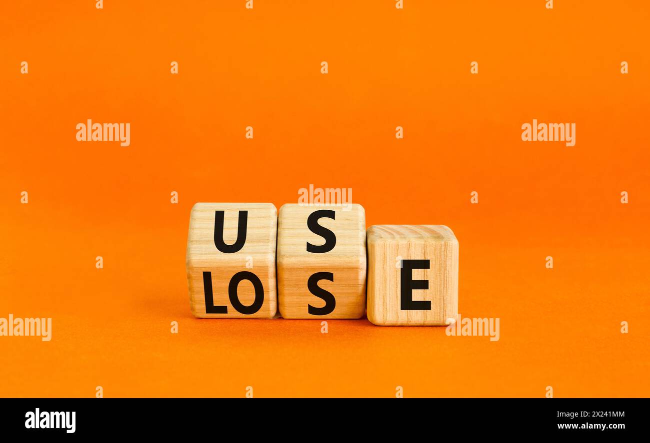 You use or lose it symbol. Concept word Use or lose on wooden cubes ...