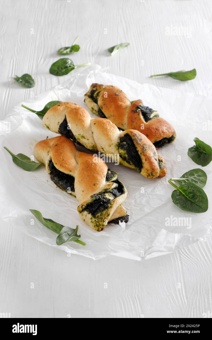 Yeast bread sticks with spinach Stock Photo - Alamy