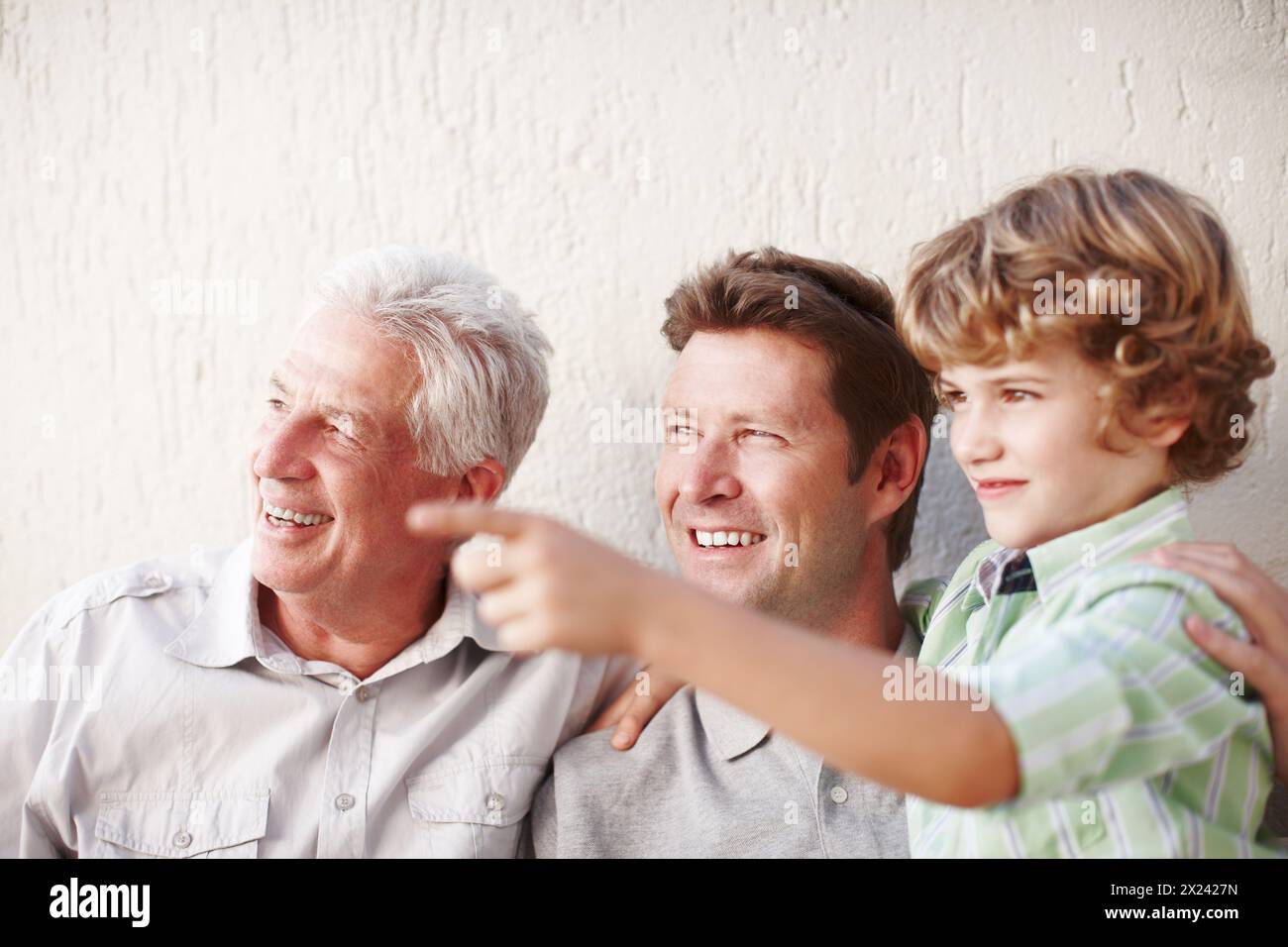 Pointing, family and grandpa, dad and child in home for bonding, happy ...