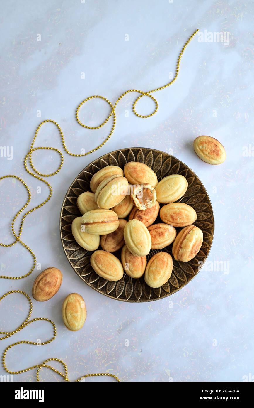 Shortbread biscuit nuts with boiled condensed milk Stock Photo - Alamy
