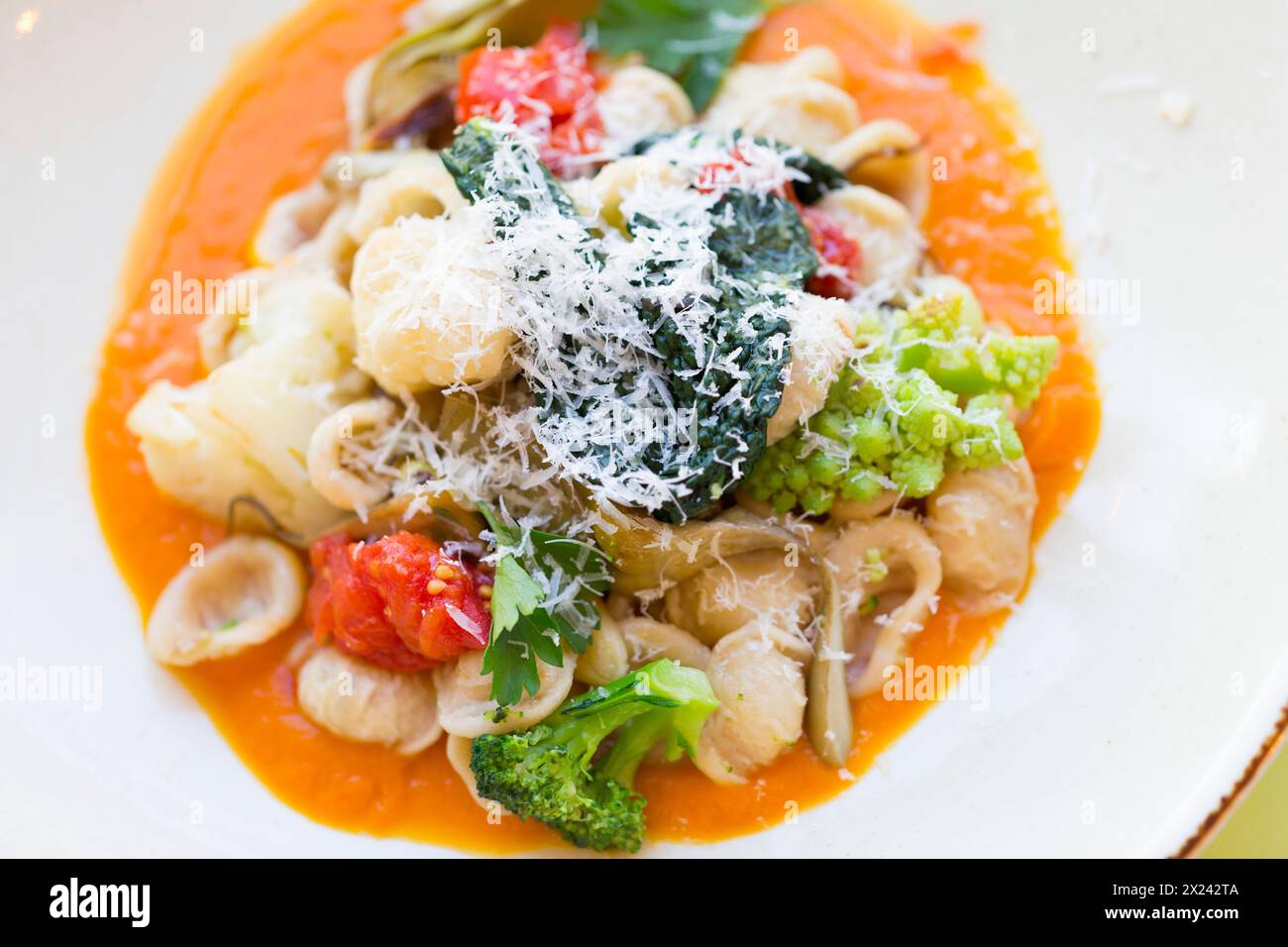 Orecchiette with black cabbage, beetroot and sun-dried tomatoes Stock ...