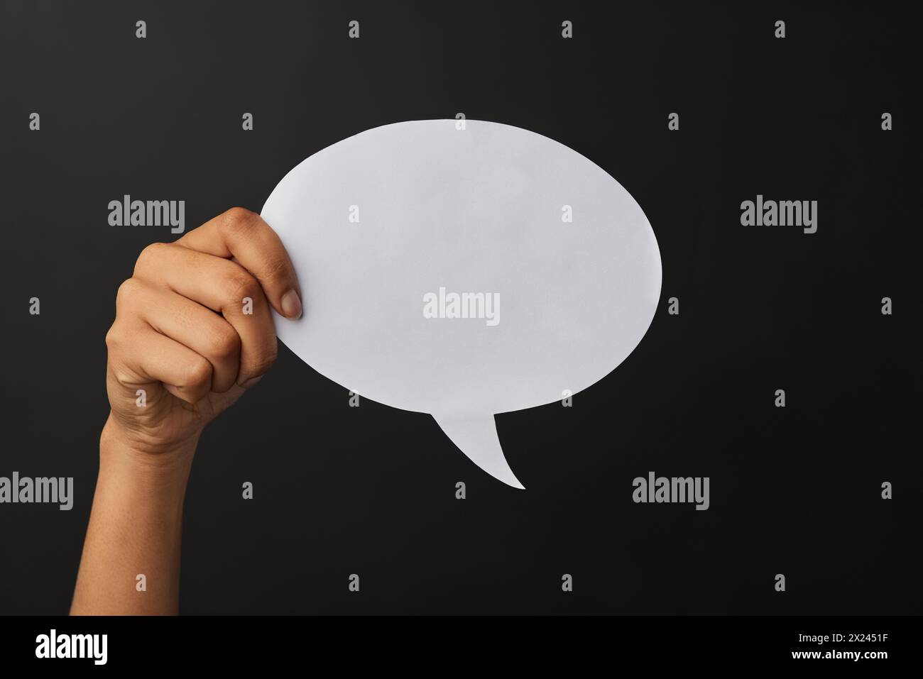 Hand, speech bubble and announcement in studio for social media, sign ...