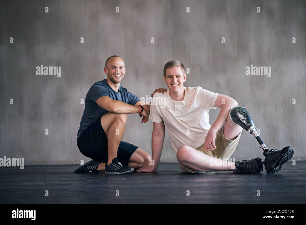Physiotherapist, person with a disability and prosthetic leg and smile ...