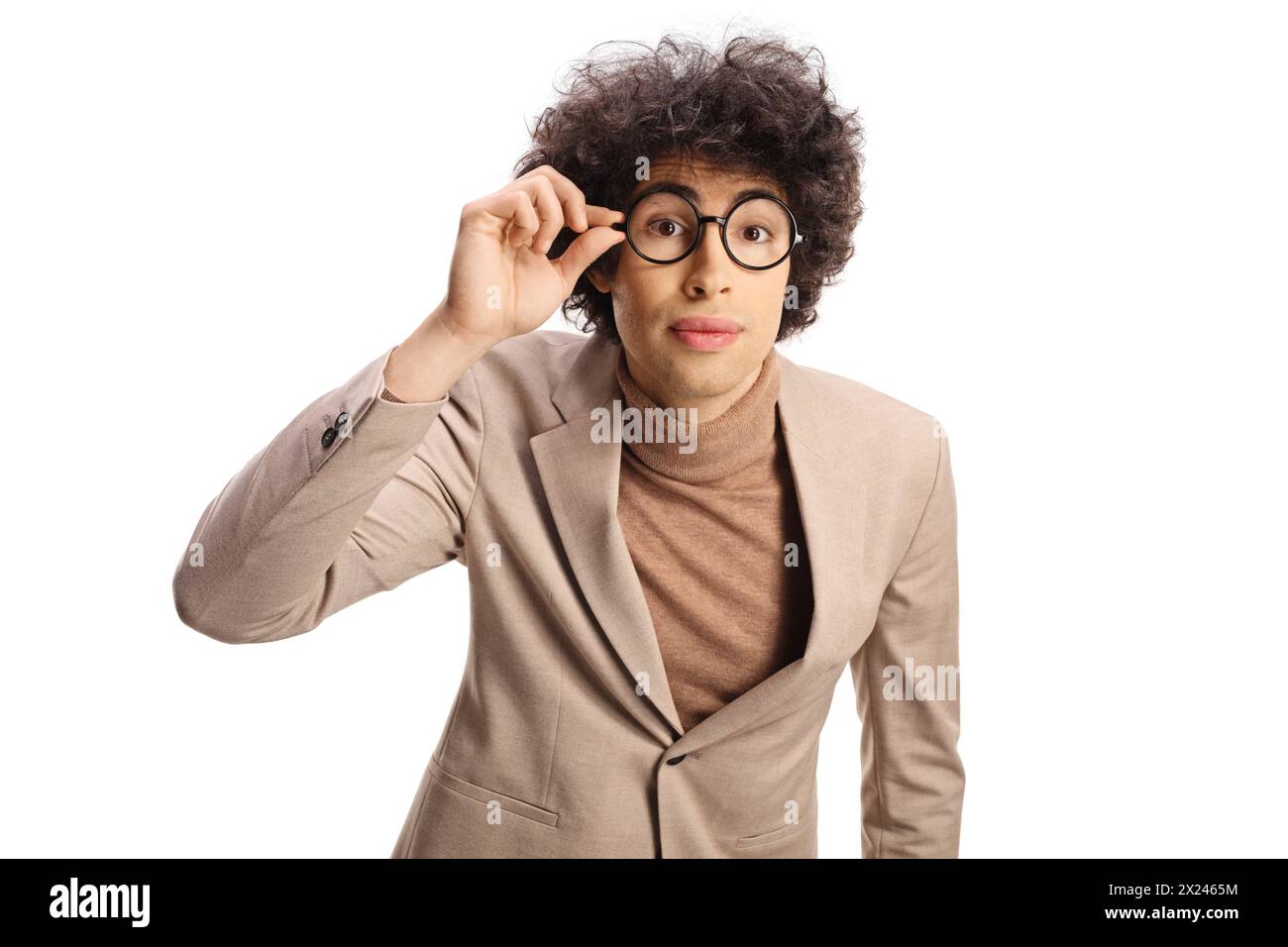 Curious young man looking through his glasses isolated on white ...